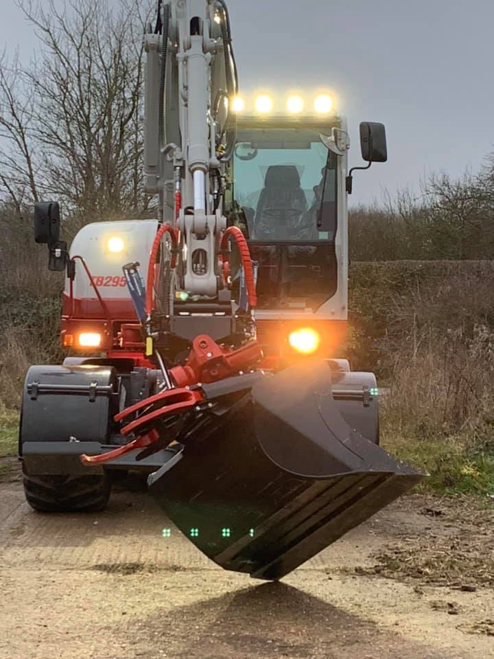 Takeuchi TB295W Partnering a Rototilt R3 S45+S45 ICS Sensor Control ...