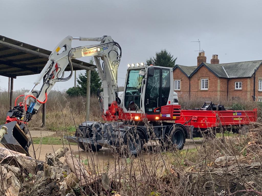 Takeuchi TB295W Partnering a Rototilt R3 S45+S45 ICS Sensor Control ...
